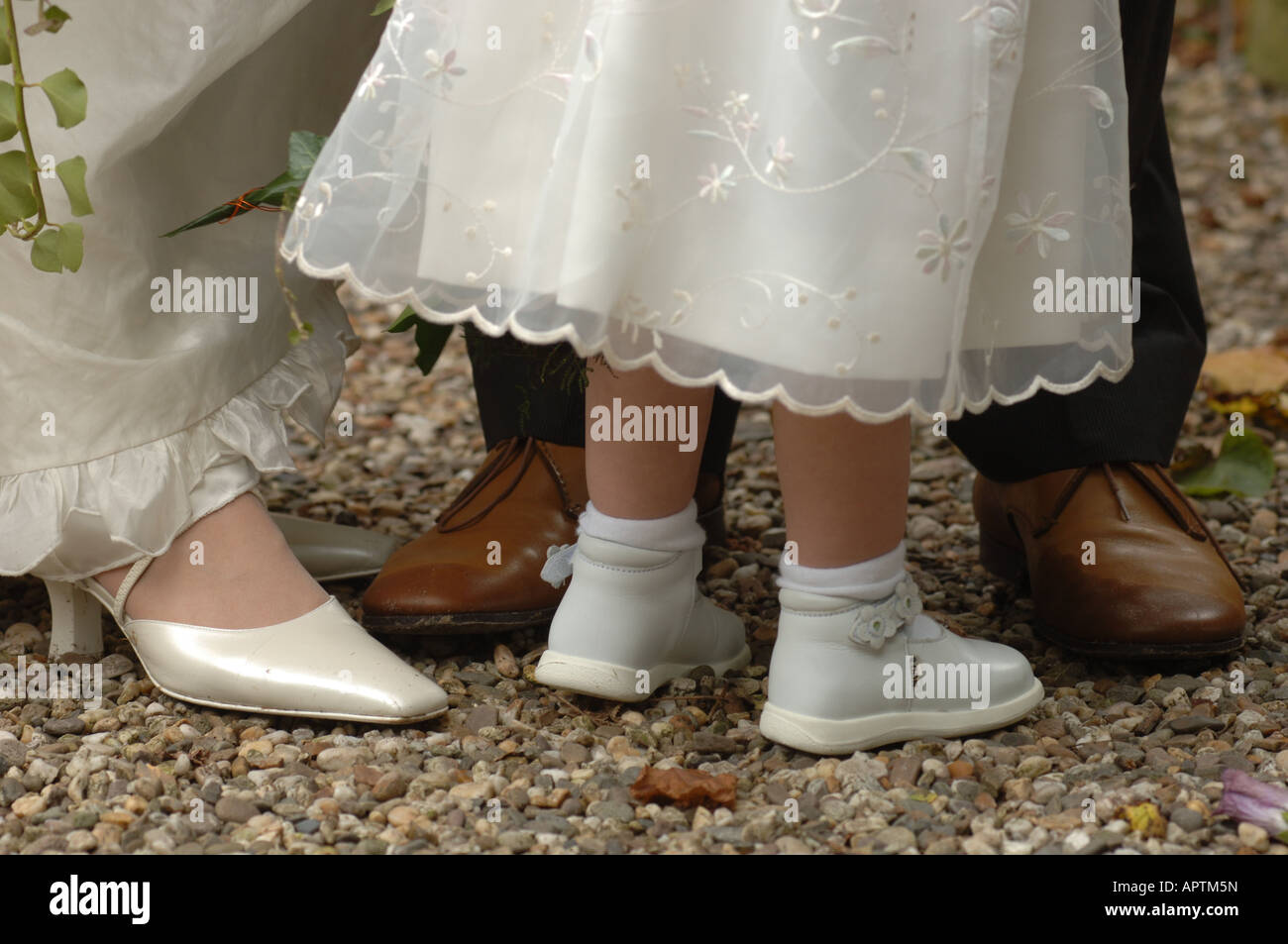 bride, groom and child Stock Photo - Alamy