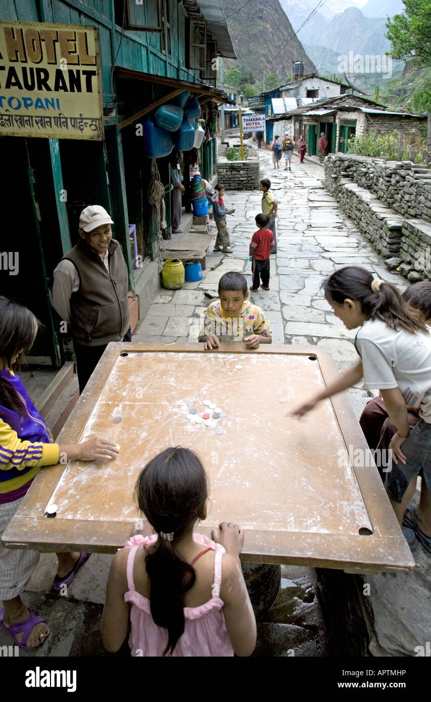 Children playing carrom hi-res stock photography and images - Alamy