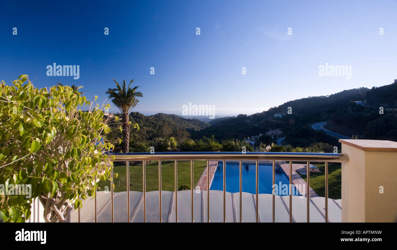 Modern Spanish villa terrace overlooking swimming pool Stock Photo - Alamy