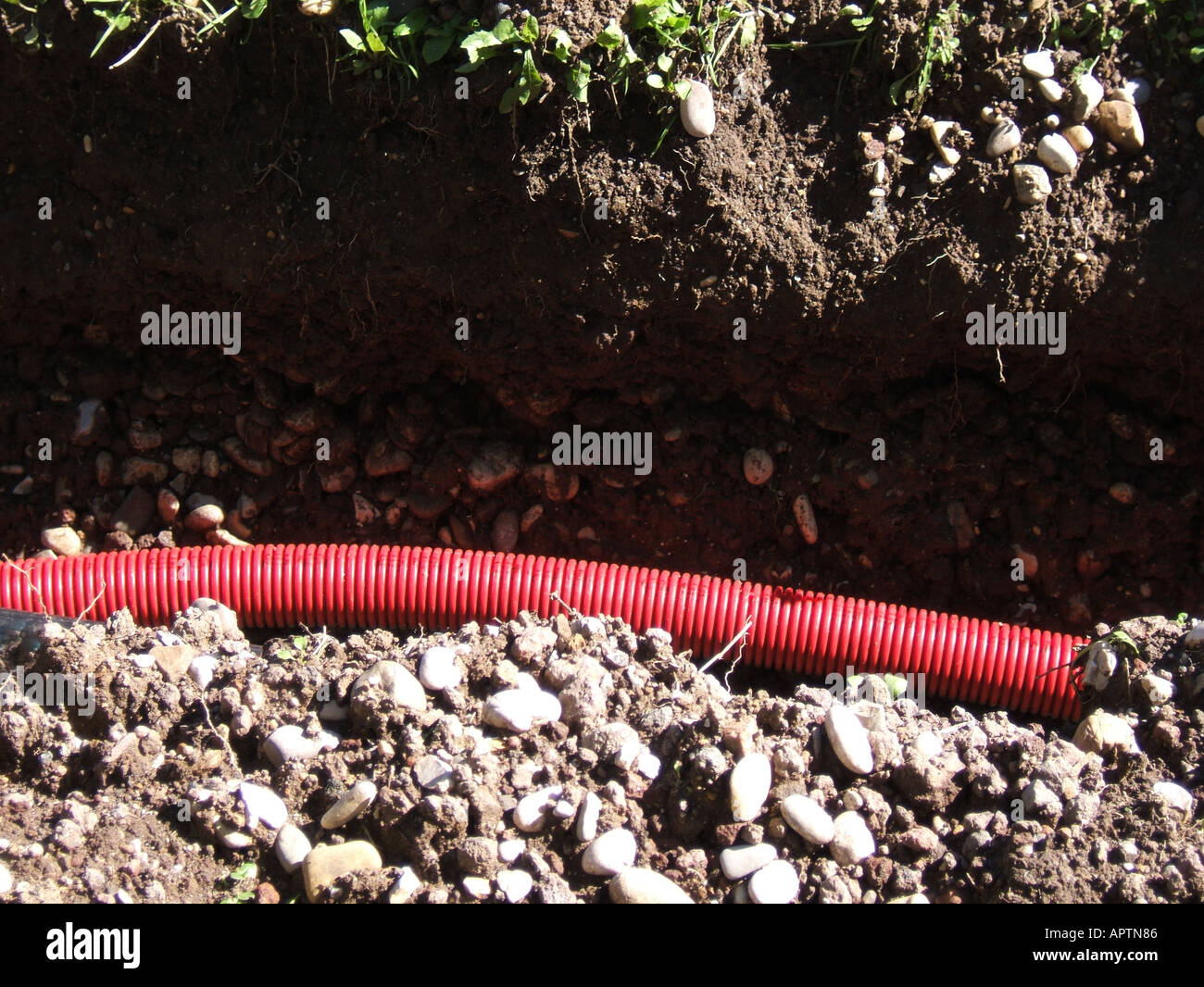 pipe laying in ditch Stock Photo - Alamy