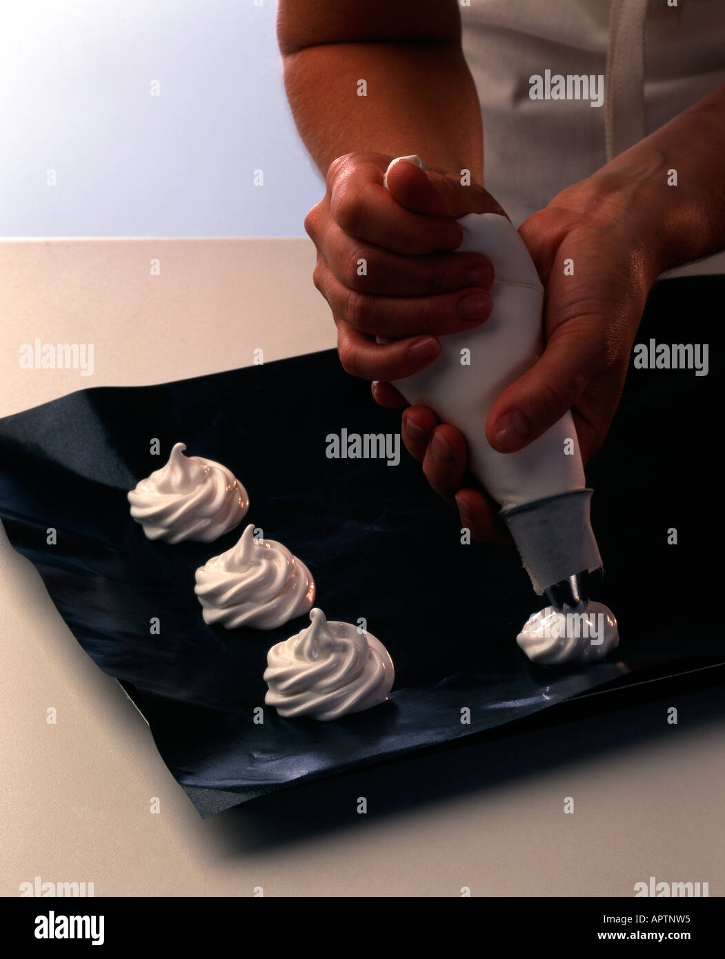 Steps to making small meringue rosettes - pipe rosettes using one ...