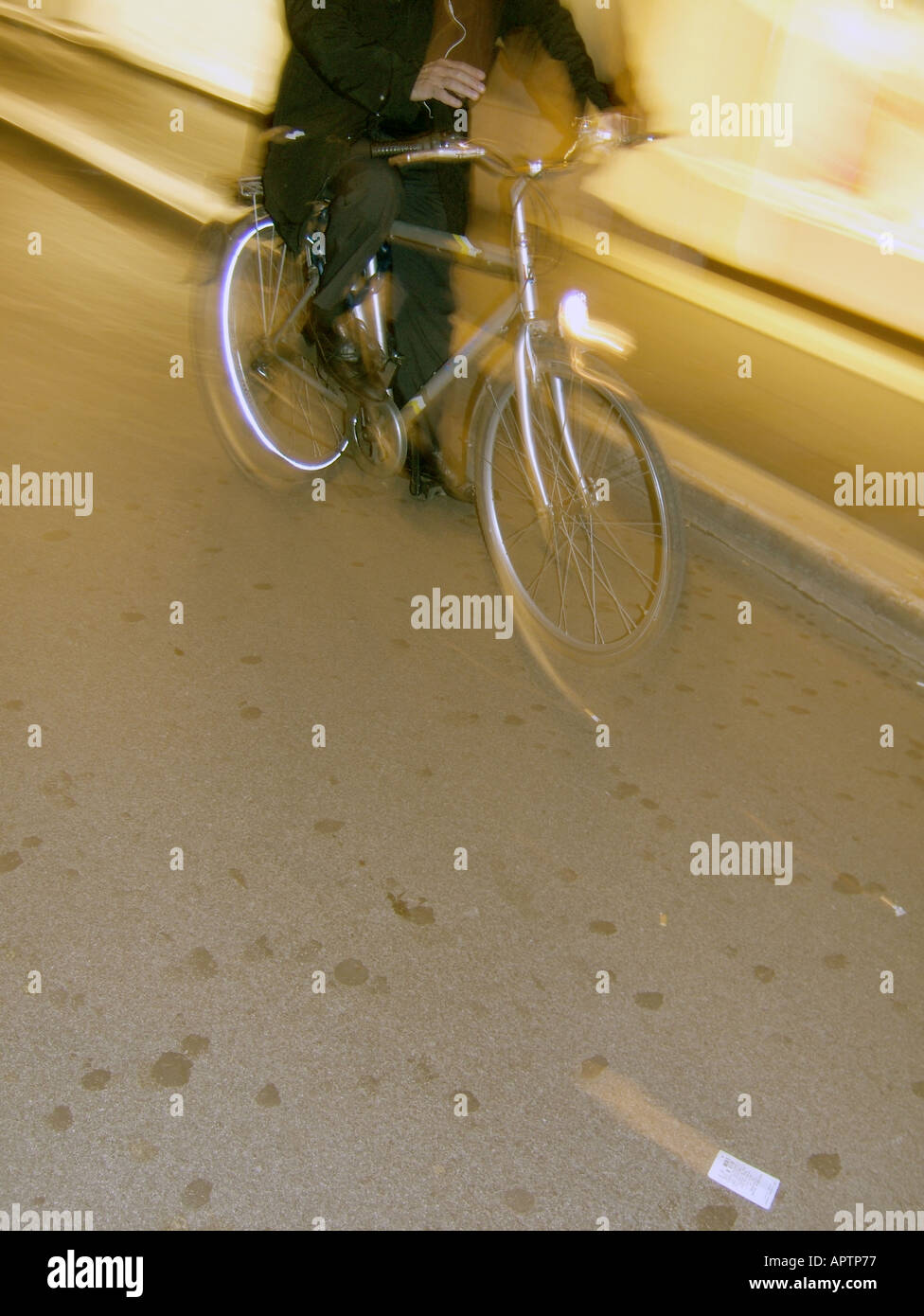 commuter riding bike at night Stock Photo - Alamy