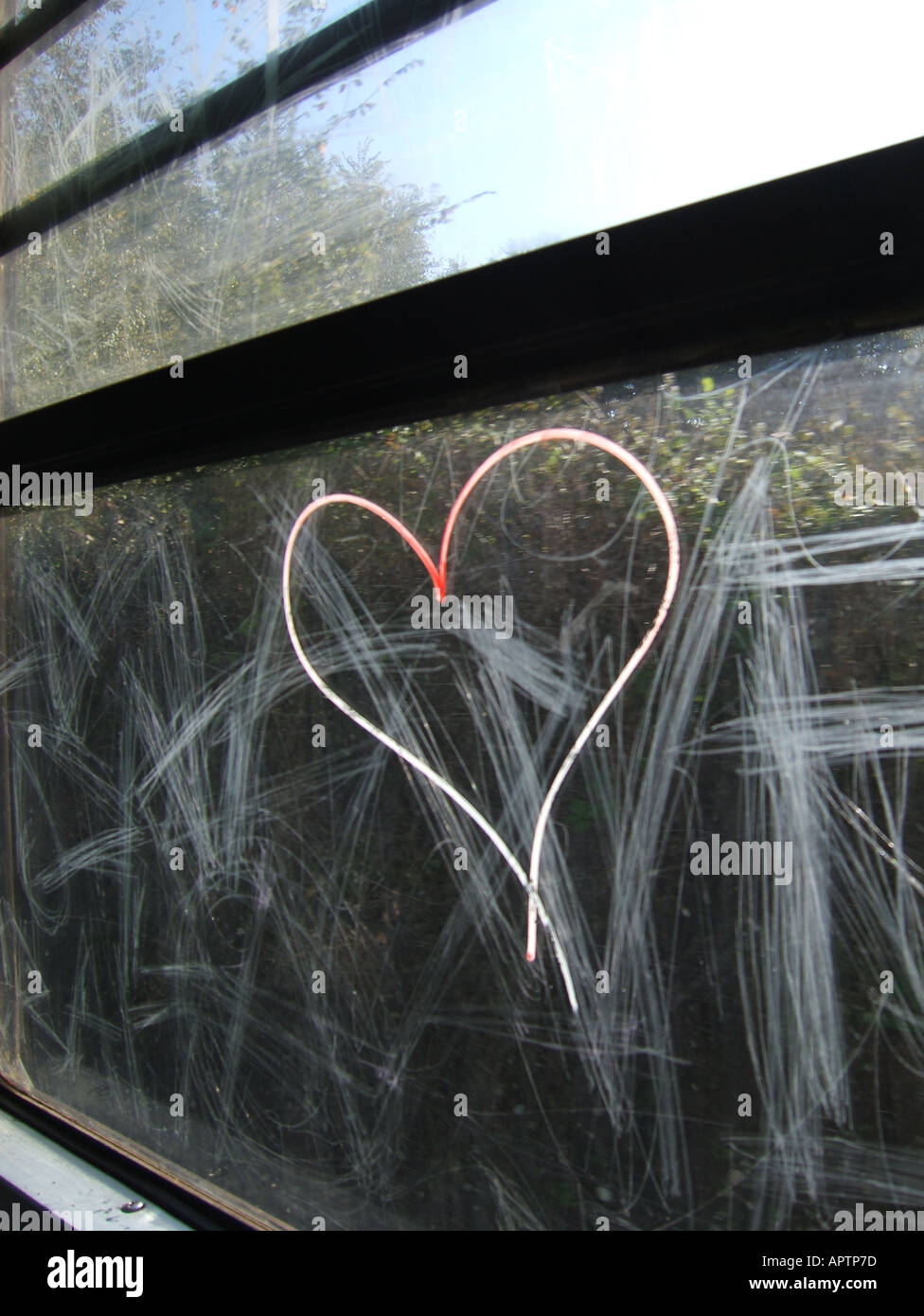 red heart drawn on train window Stock Photo - Alamy