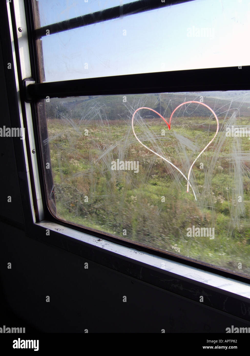 red heart drawn on train window Stock Photo - Alamy