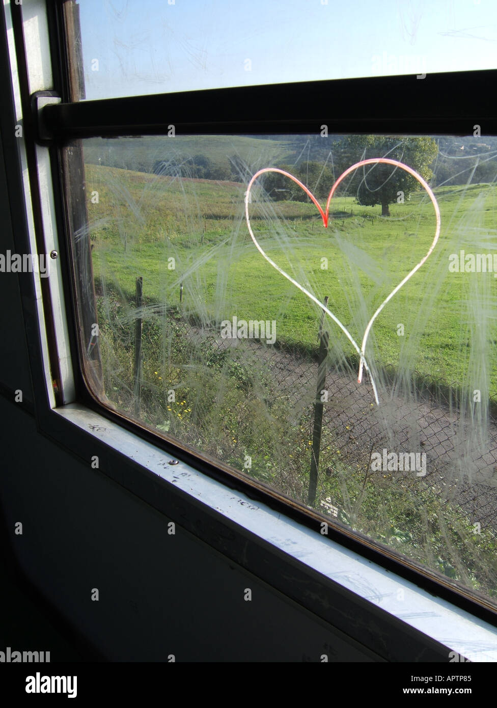 red heart drawn on train window Stock Photo - Alamy