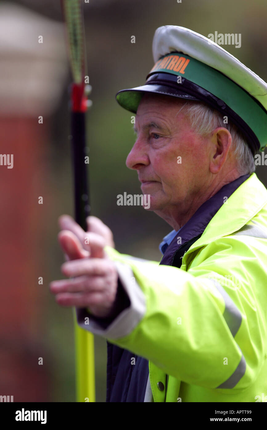 A crossing patrol man on duty Stock Photo - Alamy
