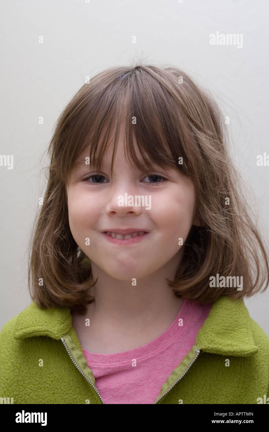Four year old girl with a goofy smile Stock Photo - Alamy