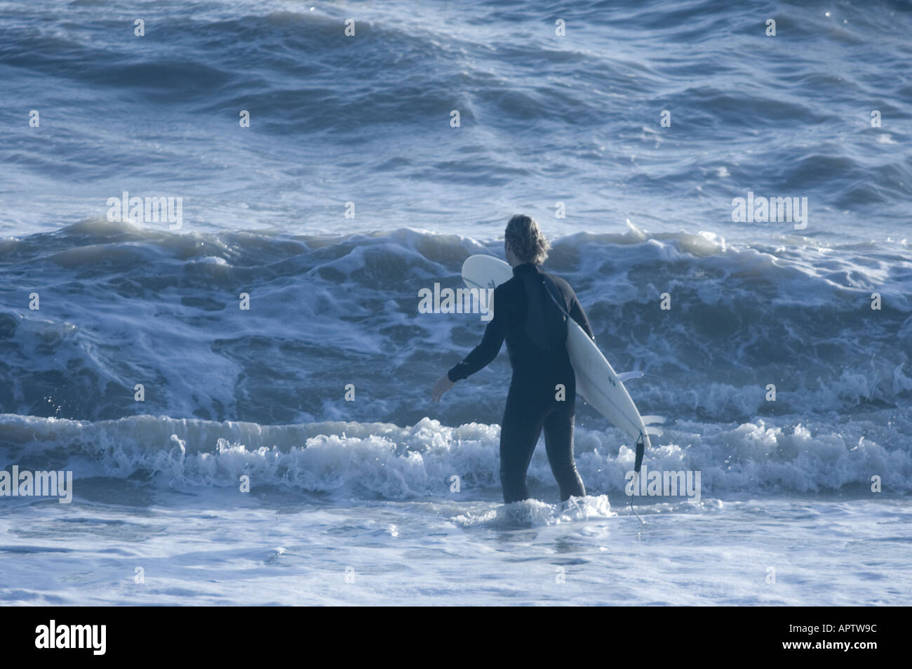 Girl entering the water hi-res stock photography and images - Alamy