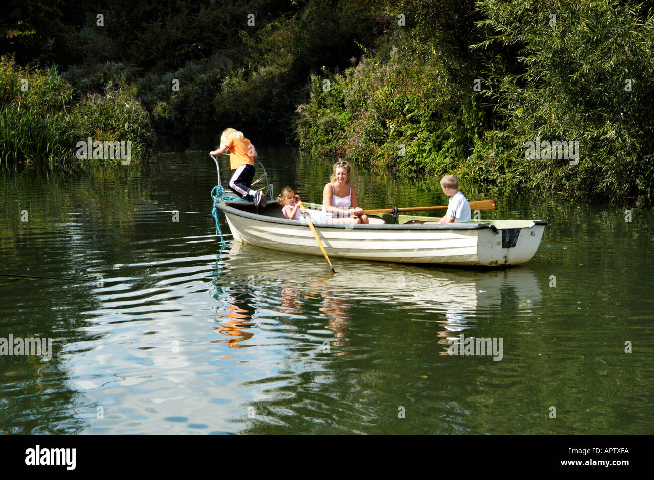 Boy girl in row boat hi-res stock photography and images - Alamy