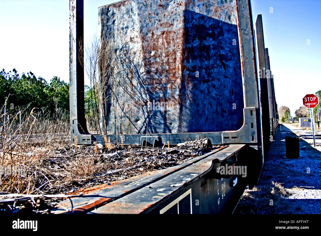 Old railroad car overgrown with weeds Stock Photo - Alamy