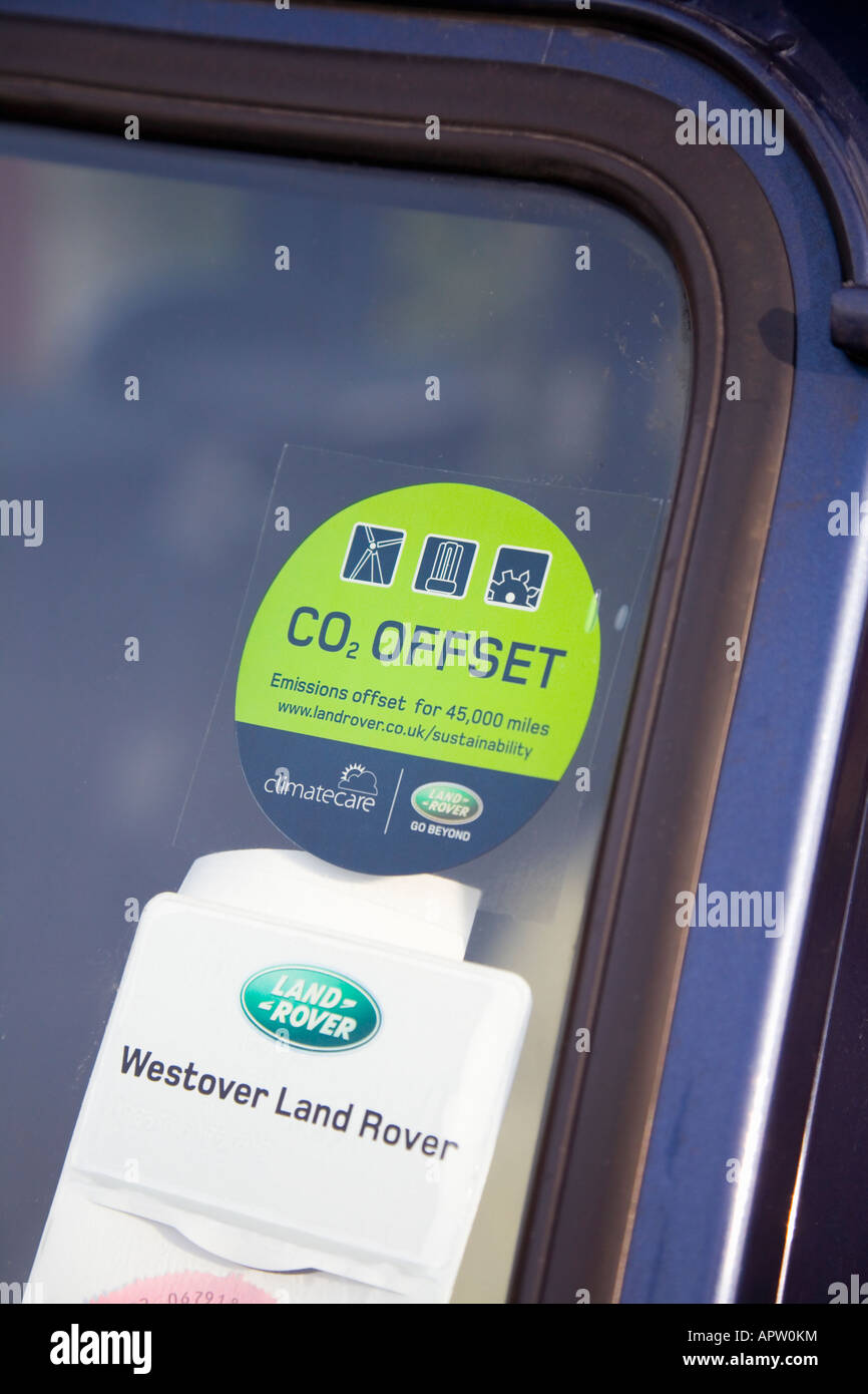 C02 Offset sticker on the windscreen of a Land Rover Defender. UK Stock ...
