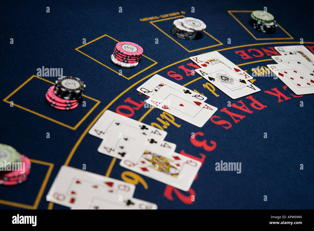 Close up of a Blackjack table winning playing cards with gambling chips ...