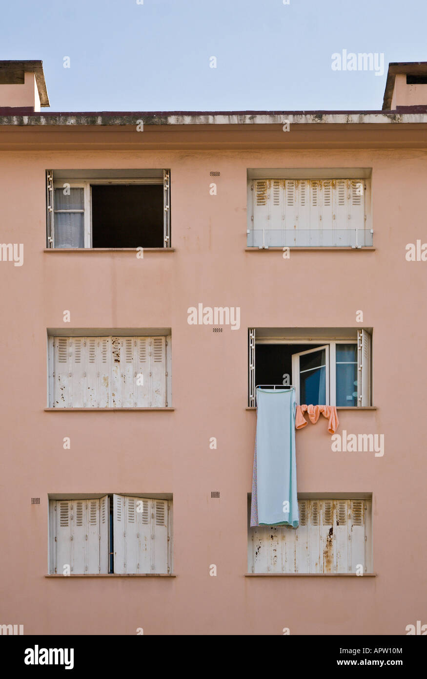 Laundry drying outside windows little resort town Stock Photo - Alamy