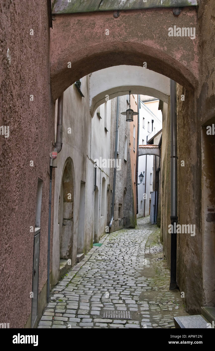 Narrow winding medieval passageway street Stock Photo - Alamy