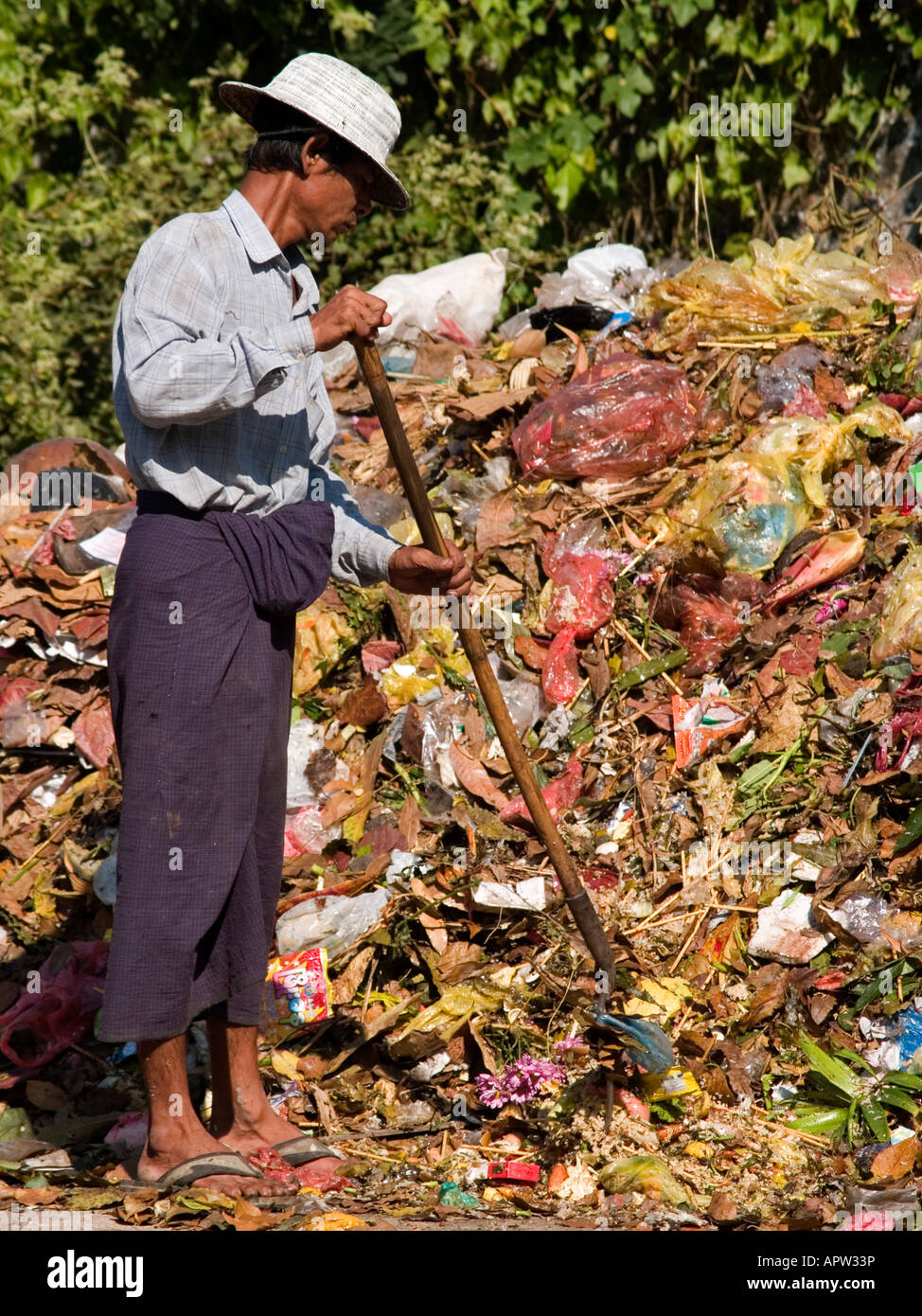garbage collector in Yangon in Burma Stock Photo - Alamy