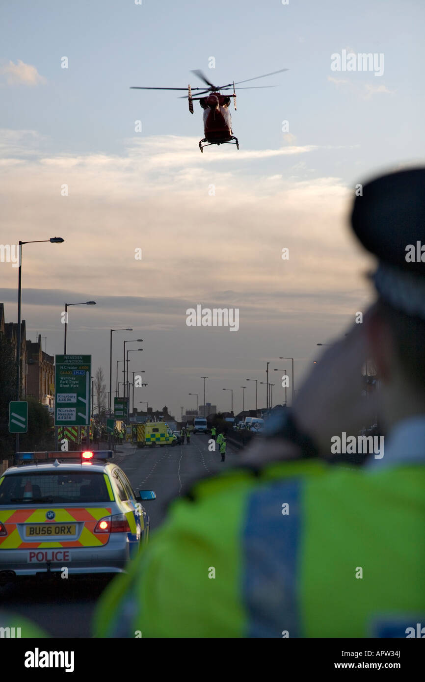 London Air Ambulance helicopter attending a road accident on the North ...