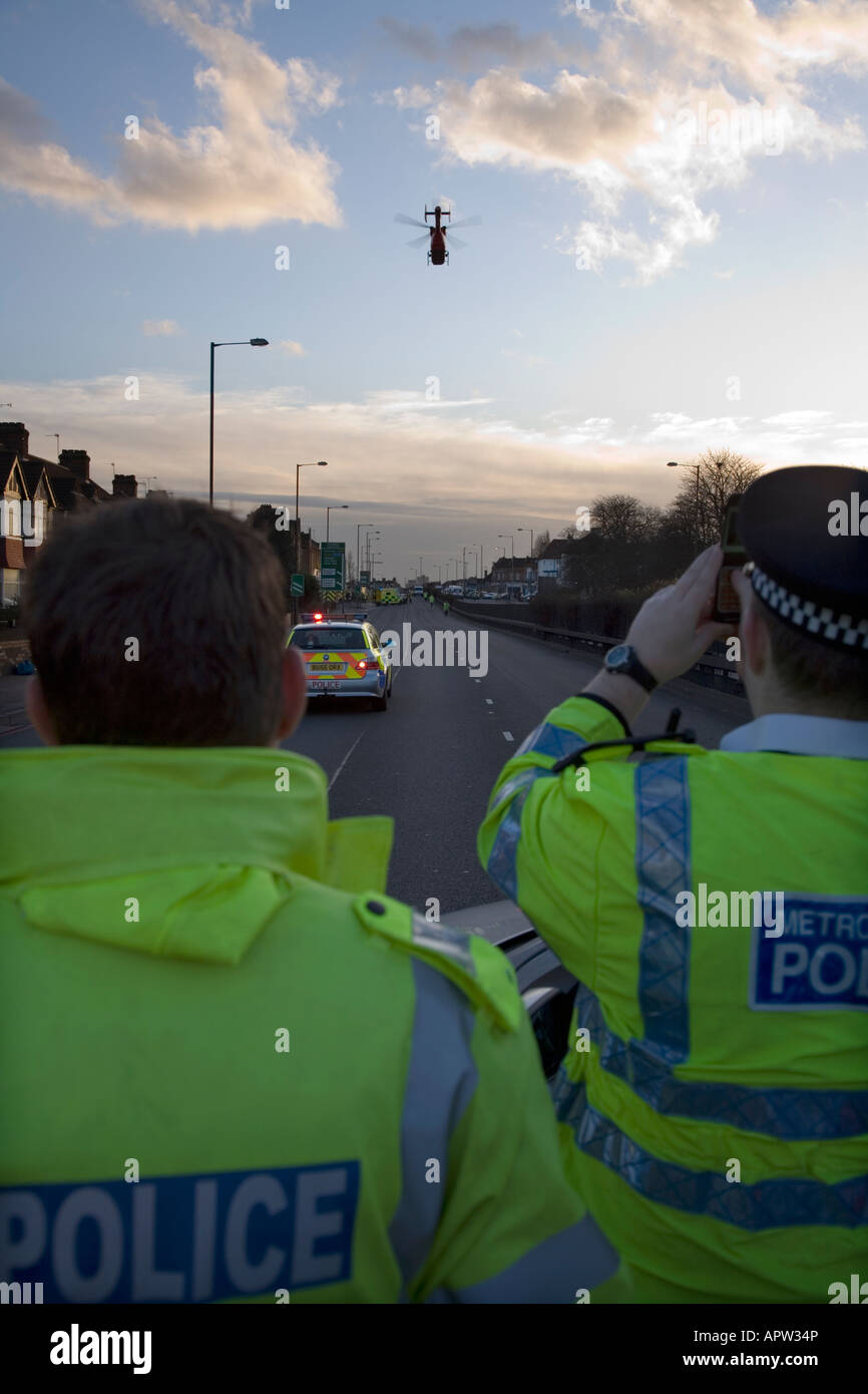 London Air Ambulance helicopter attending a road accident on the North ...