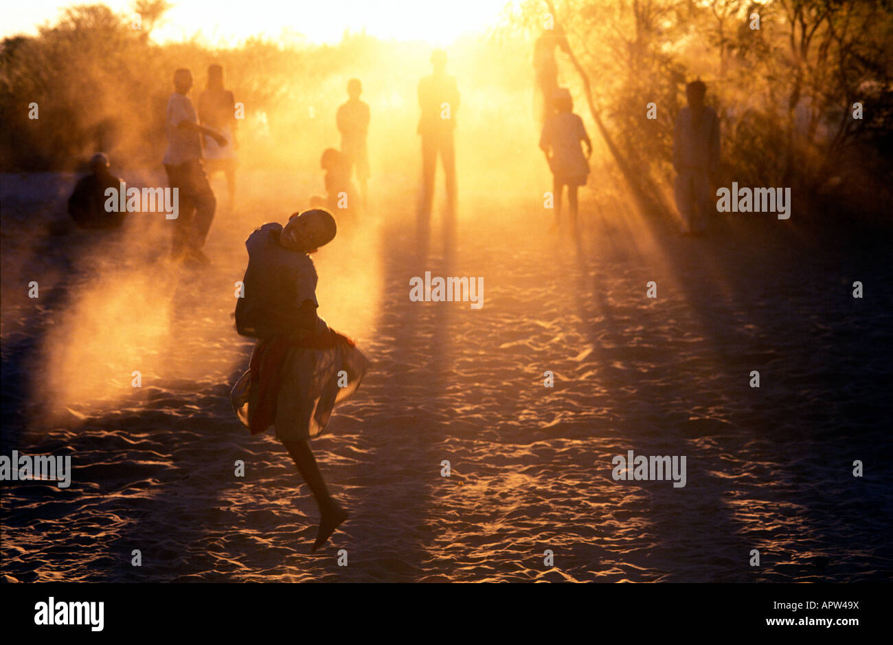 Bushman children playing in the sand Den ui village Bushmanland Namibia ...