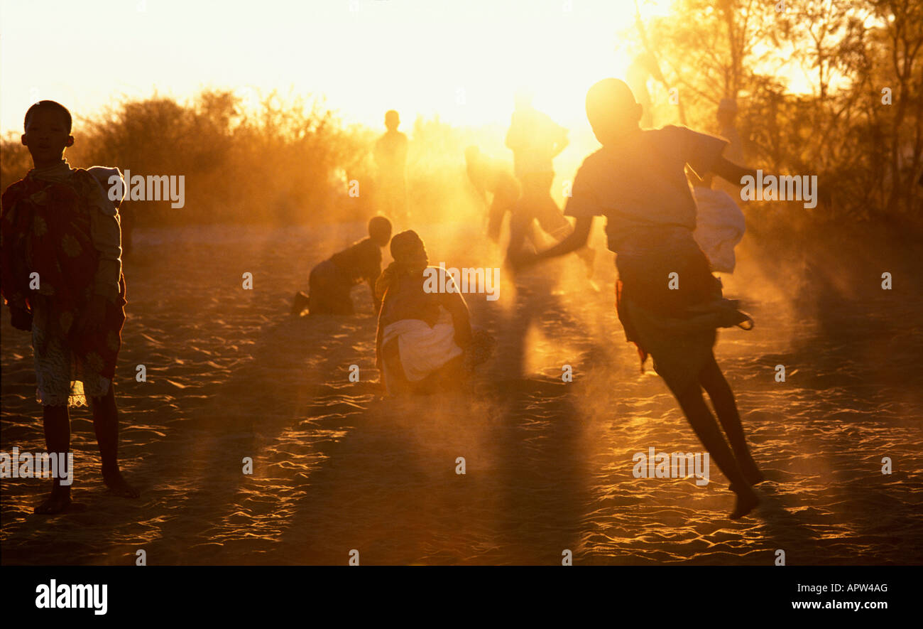 Bushman children playing in the sand Den ui village Bushmanland Namibia ...