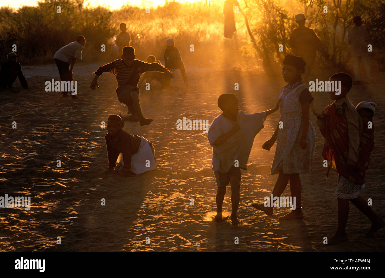 Bushman children playing in the sand Den ui village Bushmanland Namibia ...