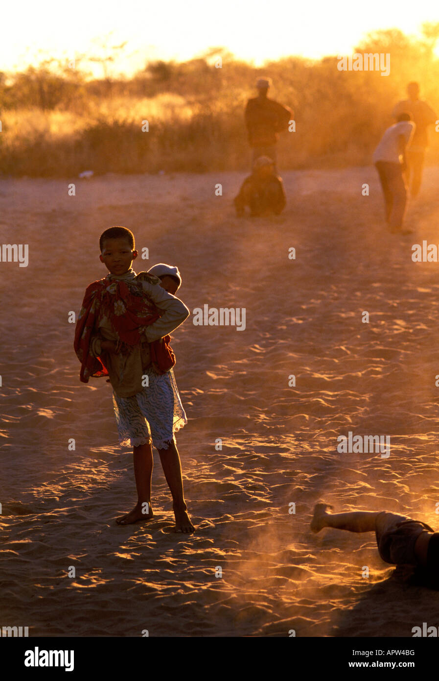 Bushman children playing in the sand Den ui village Bushmanland Namibia ...