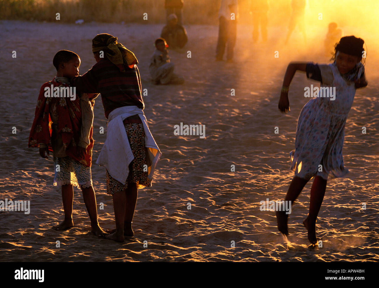 Bushman children playing in the sand Den ui village Bushmanland Namibia ...