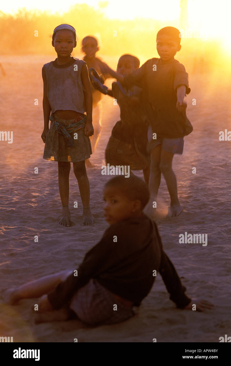 Bushman children playing in the sand Den ui village Bushmanland Namibia ...