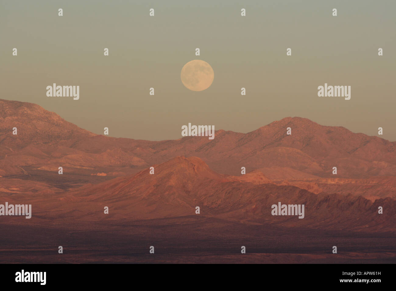 The moon over red rock Stock Photo - Alamy