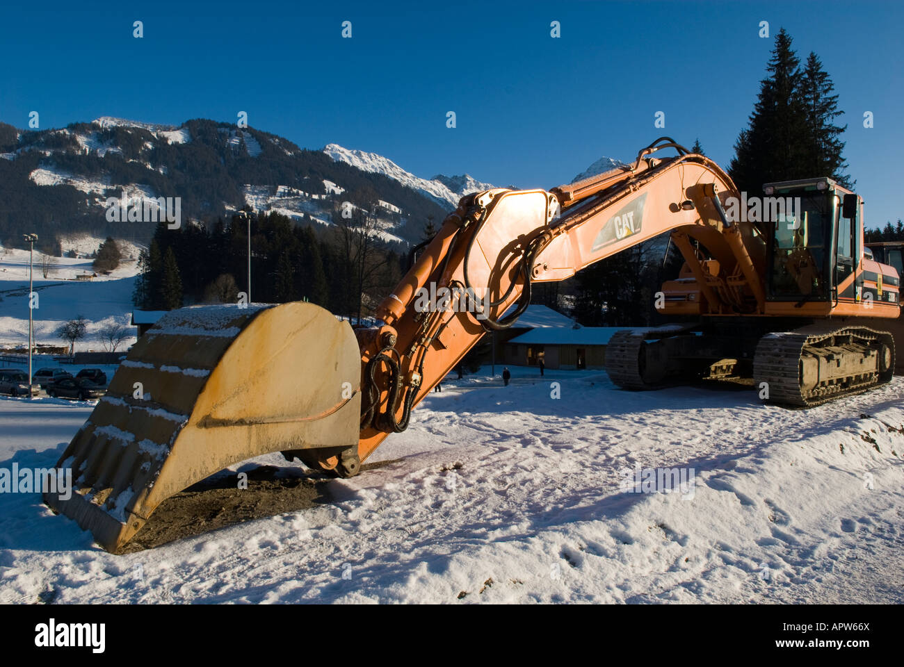 Digger in winter landscape, between Altstaedten and Fischen Oberallgaeu ...
