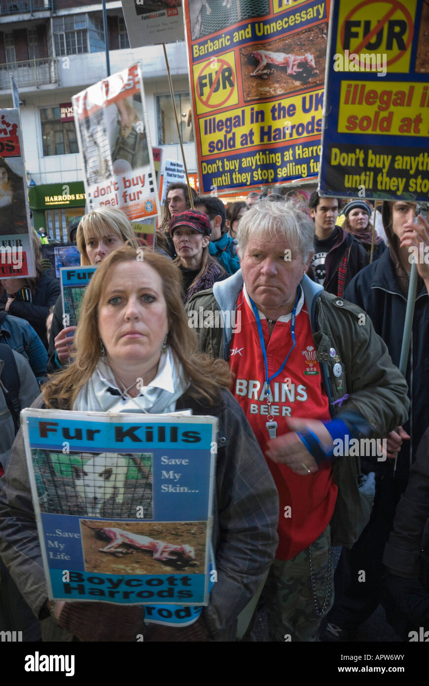 A man and woman in the crowd of anti-fur protesters outside Harrods ...