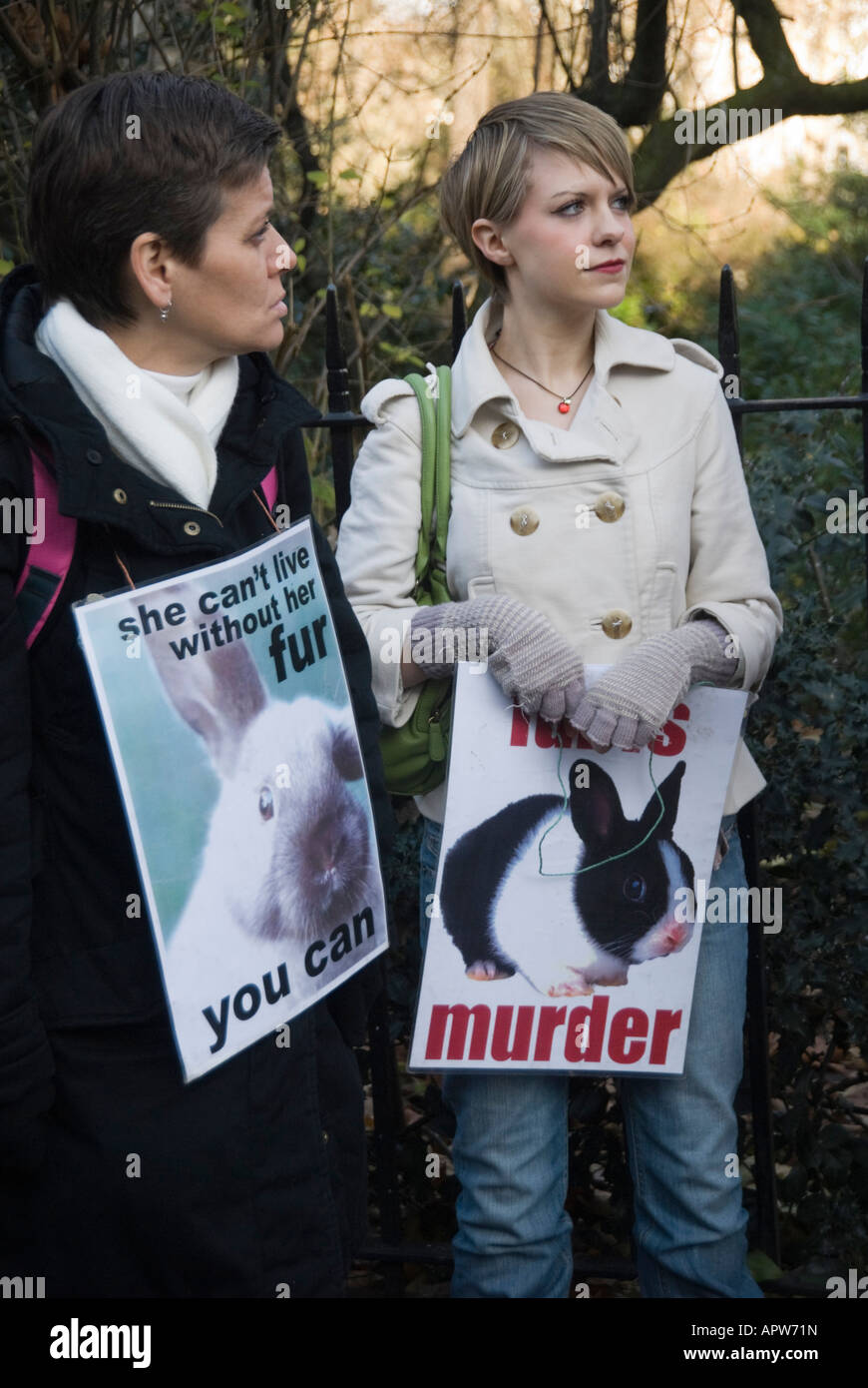 Two women with anti-fur posters at start of rally before National anti ...