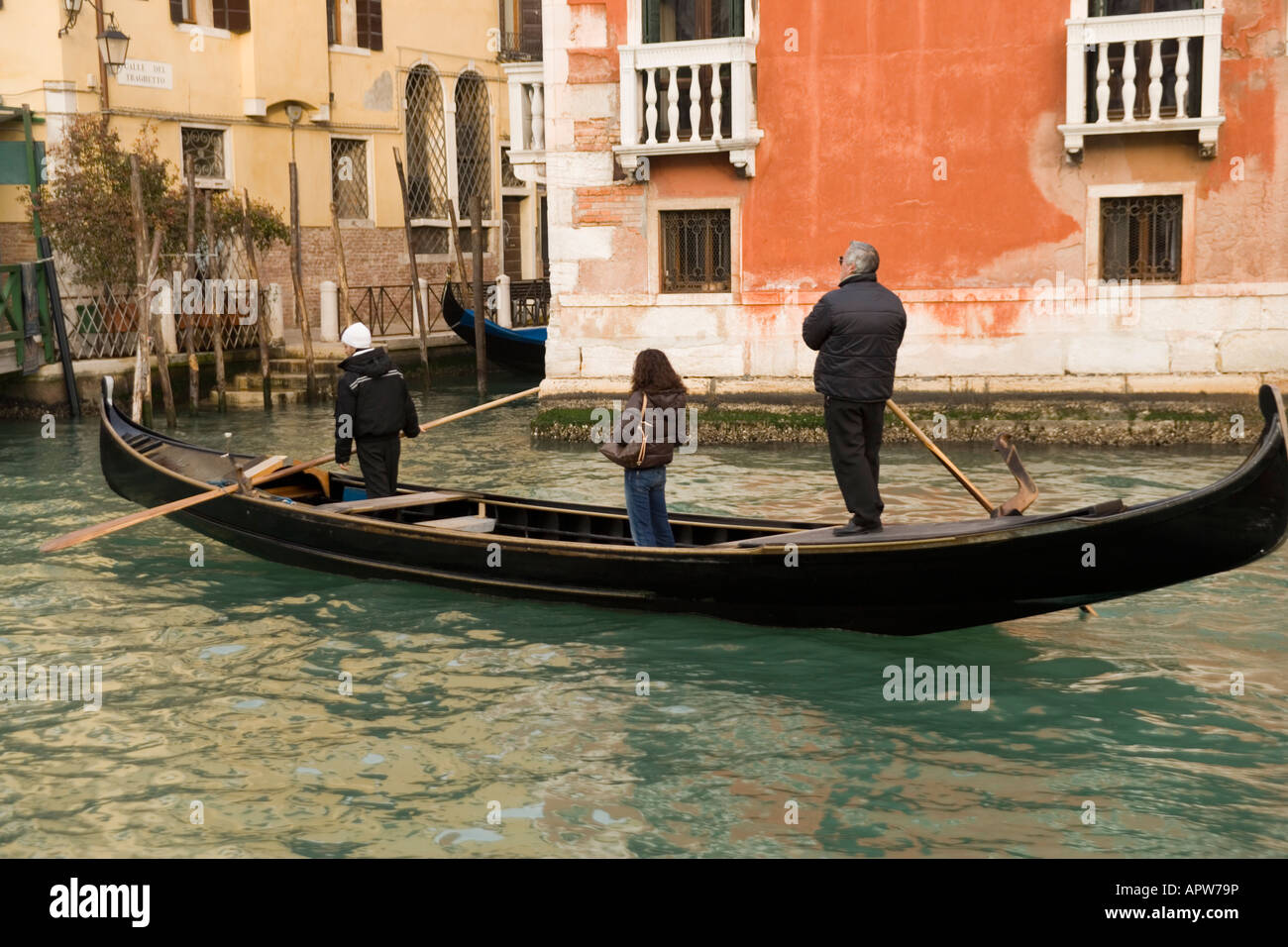 Gondola crossing the Grand Canal from the water bus, the vaporetto, Venice, Italy Stock Photo ...