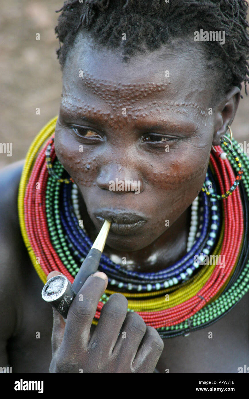 African tribe women smoking pipe hi-res stock photography and images ...