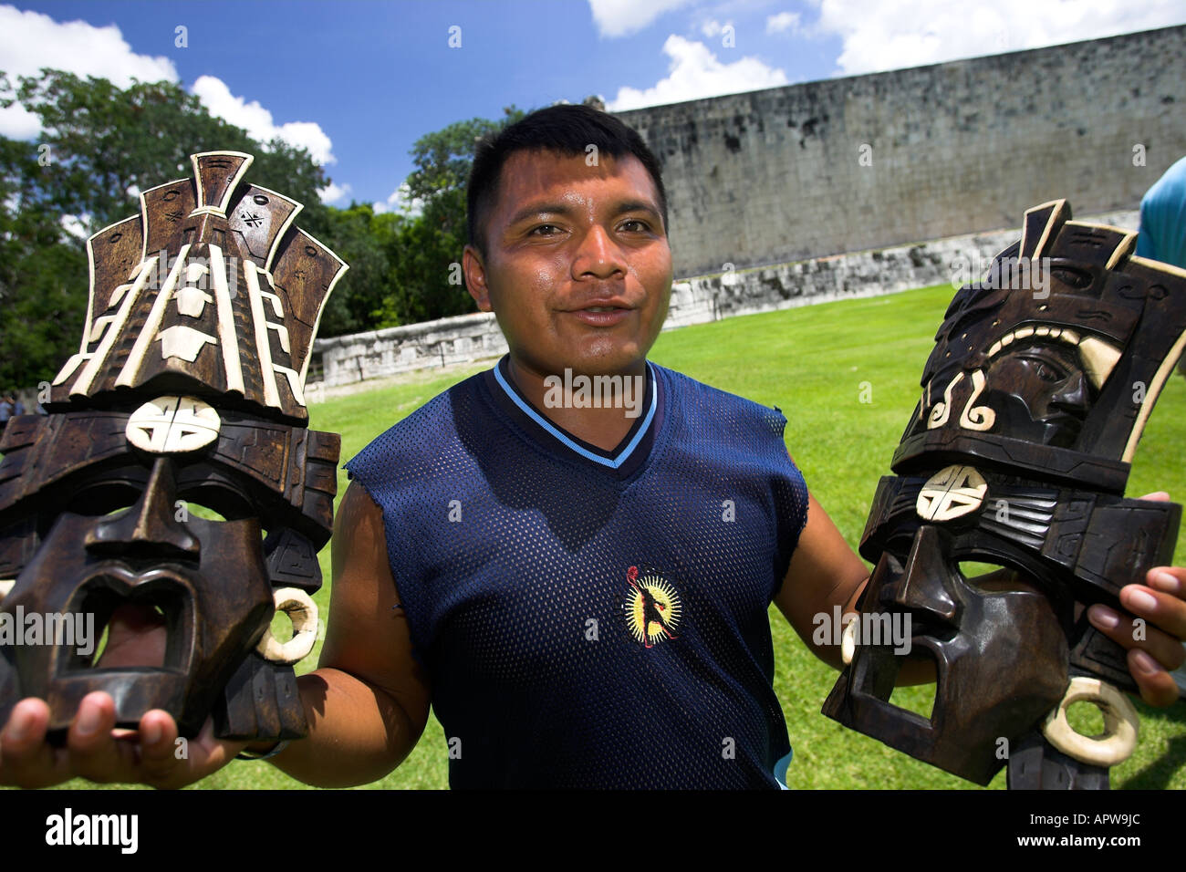 Vendor selling replica wooden Toltec masks Chichen Itza Yucatan Mexico ...