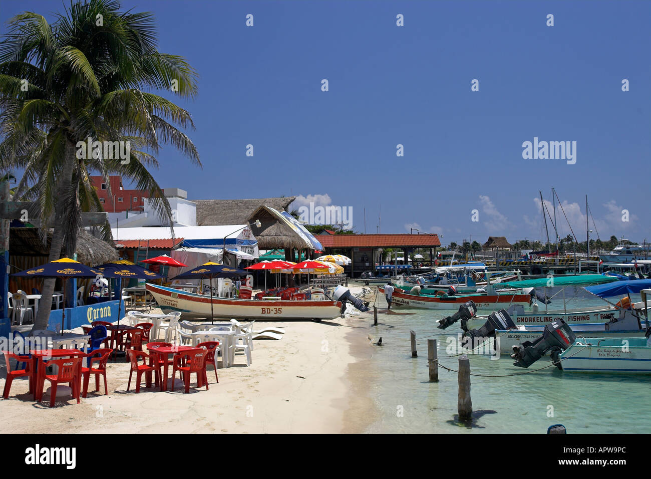 Boats at the beach jetty Isla Mujeres Mexico Stock Photo - Alamy