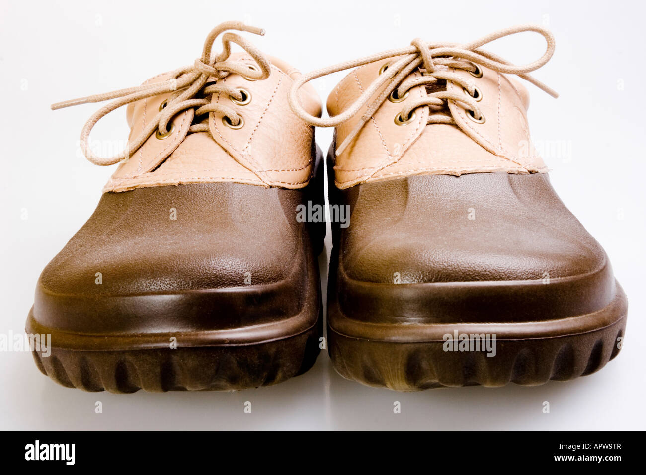 Brown and cream two toned shoes Stock Photo - Alamy