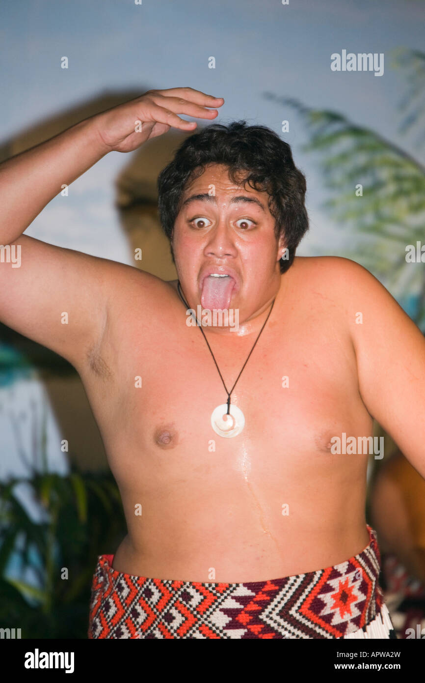 Man performing traditional Maori haka singing and dancing entertainment ...