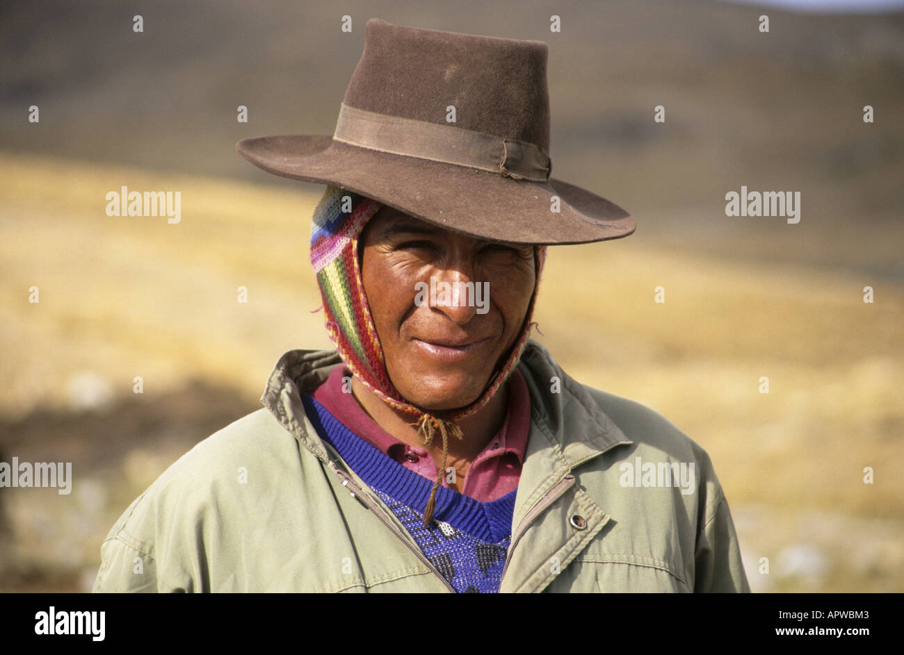 Peruvian farmer with typical Inca facial features wearing a hat Stock ...