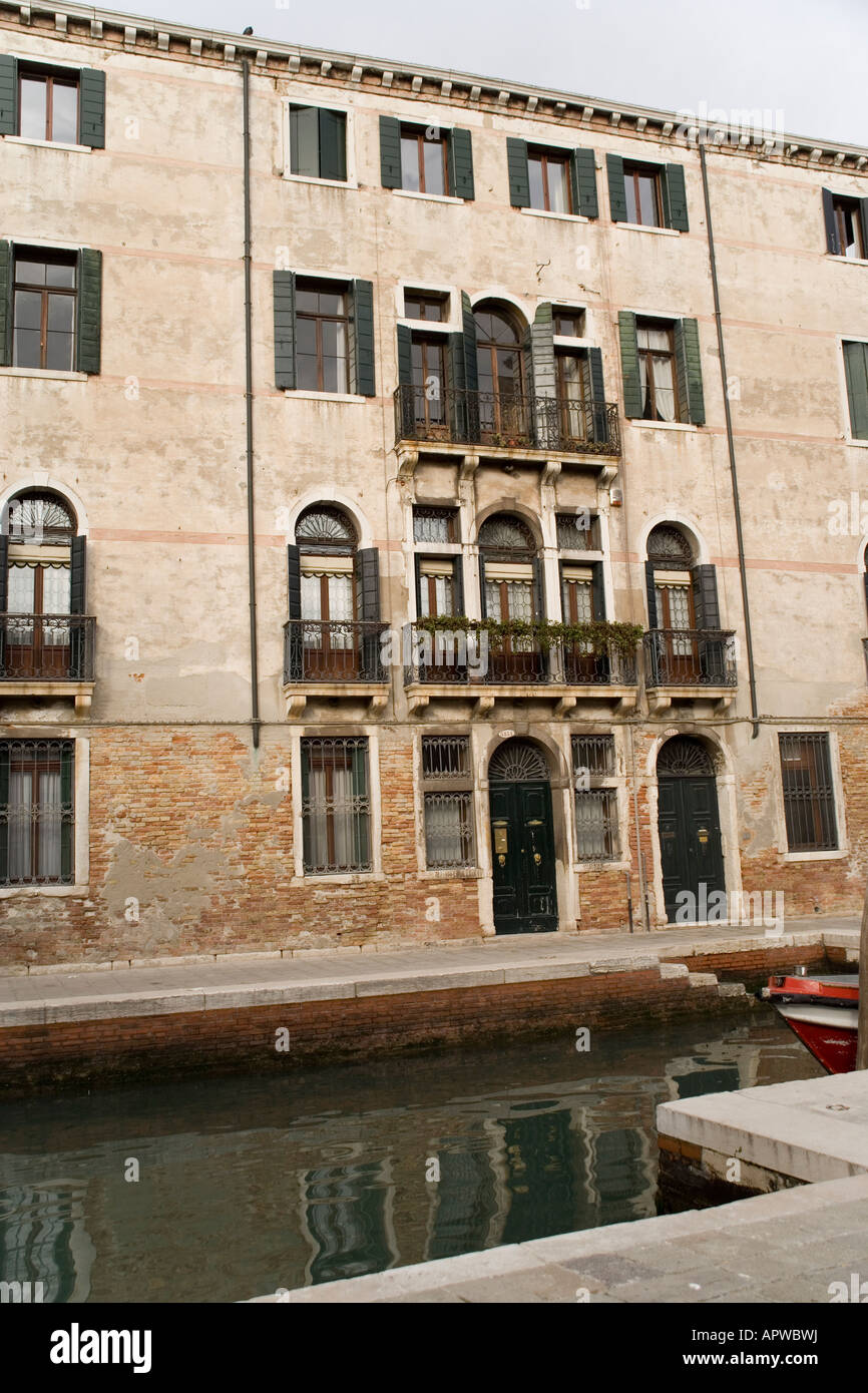 Old palazzo building and small canal in Venice, Italy Stock Photo - Alamy