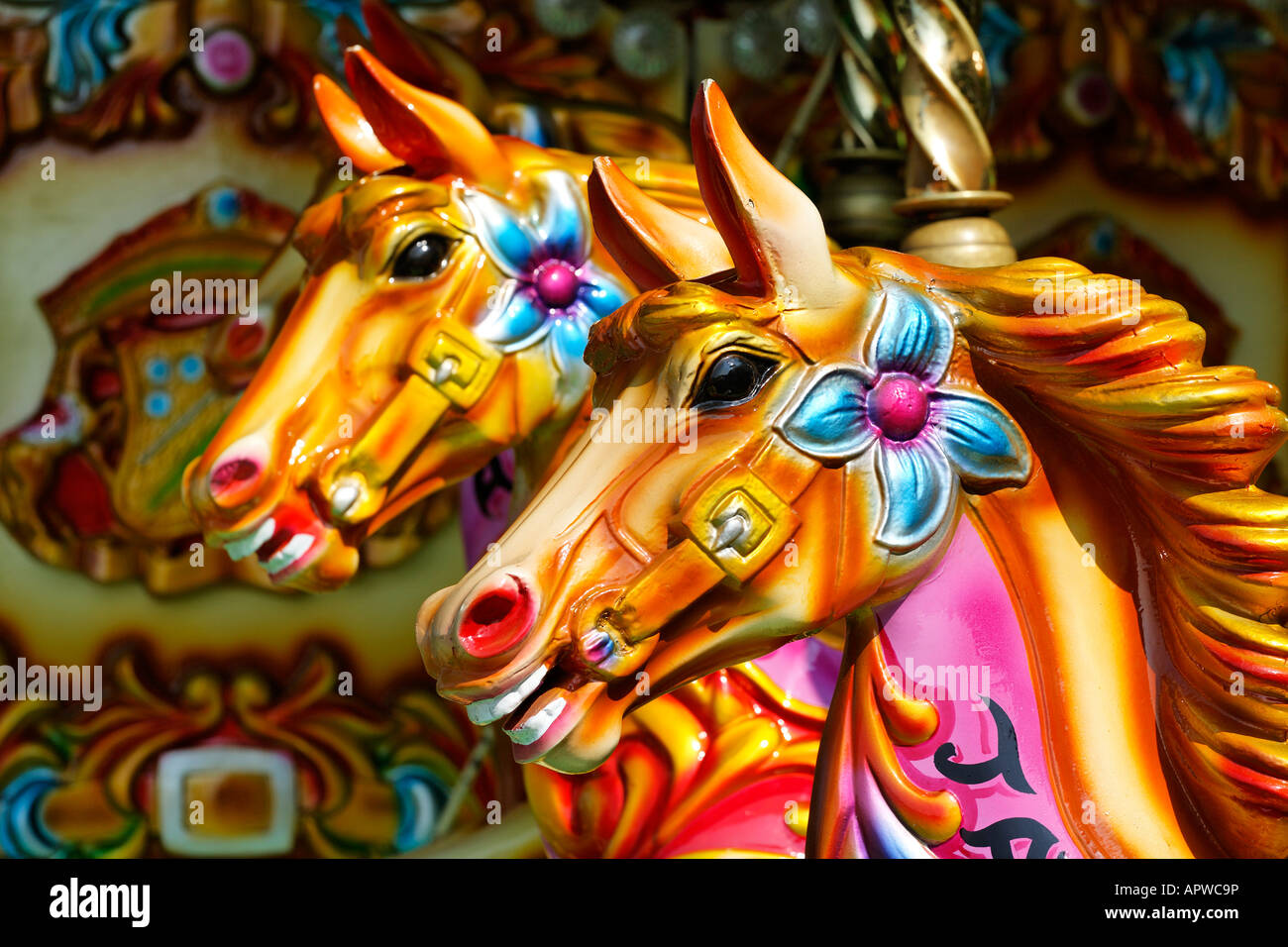 Colourful fairground horses on a Carousel London UK Stock Photo - Alamy