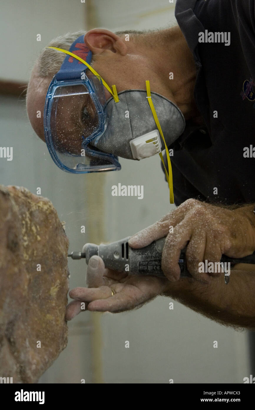 Stock Photo of Artist Engraving With a Handheld Lathe Stock Photo - Alamy