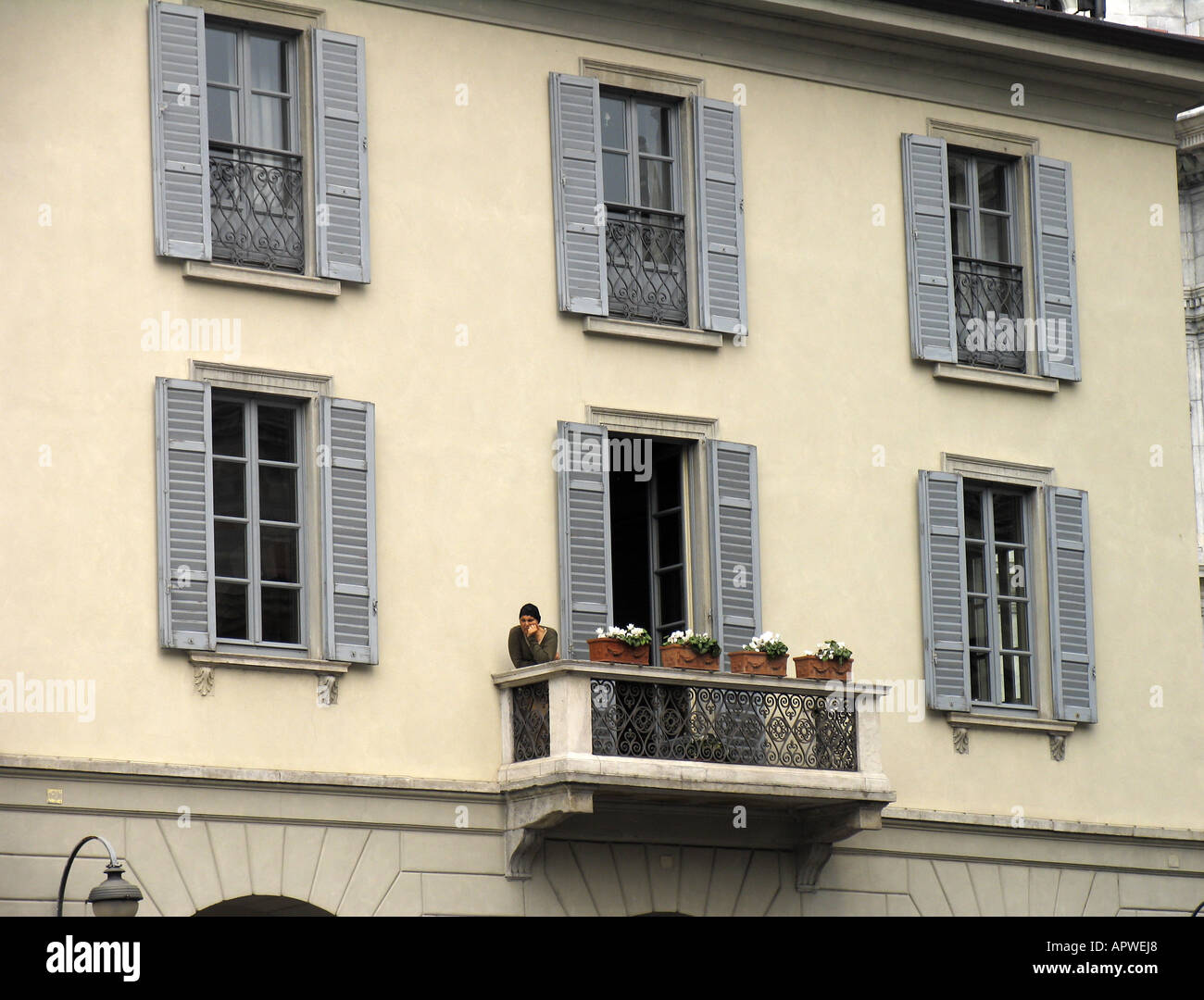Man on balcony, Lake Como, Italy, Europe Stock Photo - Alamy