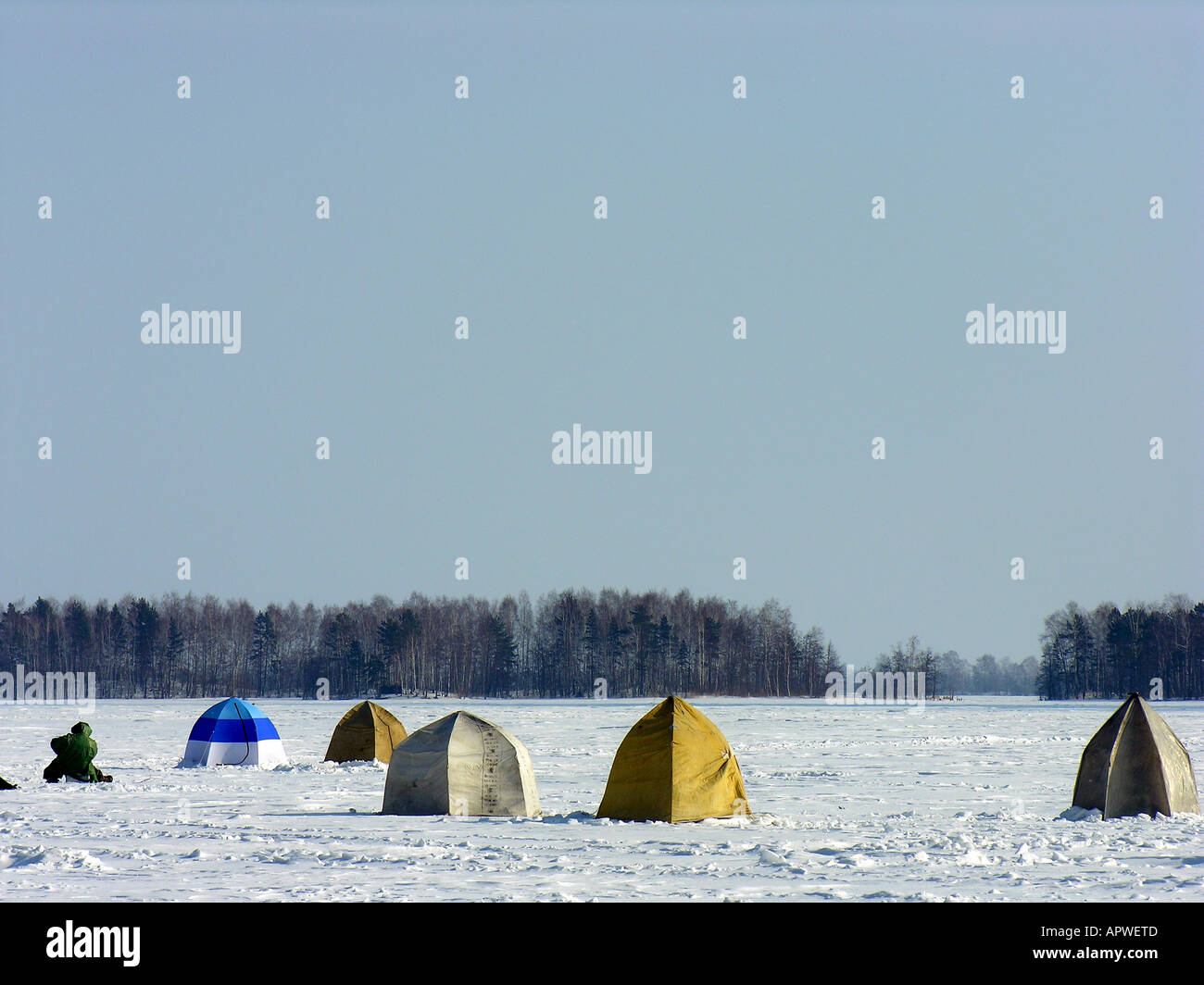 Ice fishing in Ural Mountains Russia Stock Photo - Alamy