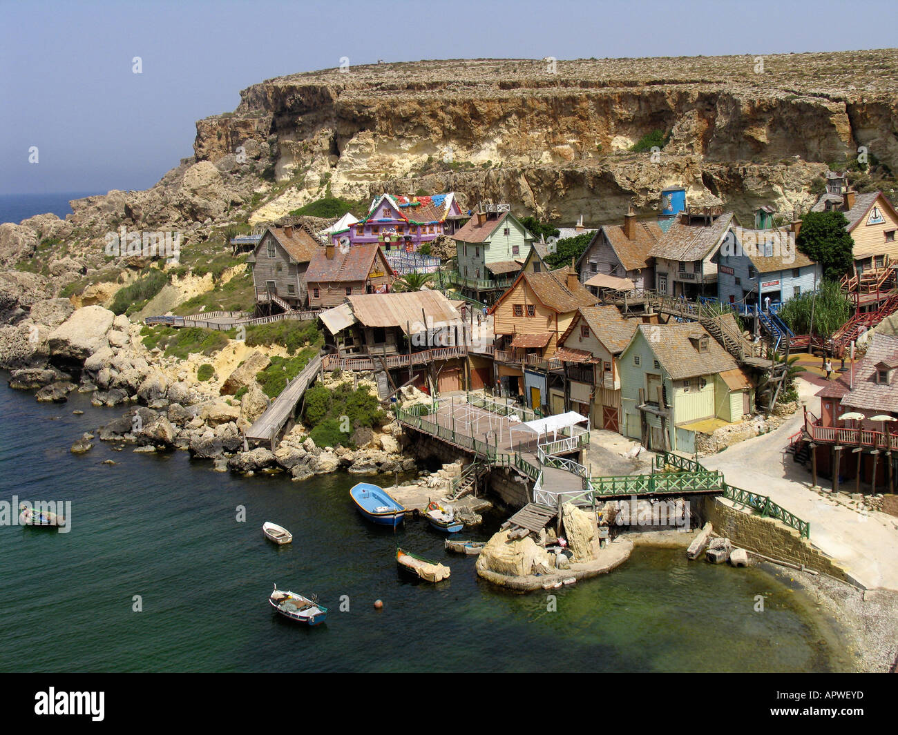 'Popeye Village' or ‘Sweethaven Village', Anchor Bay, Malta Stock Photo ...