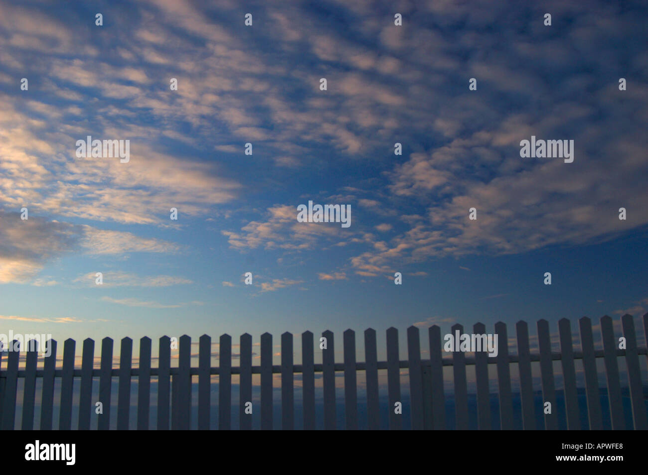 sky and fence Stock Photo - Alamy