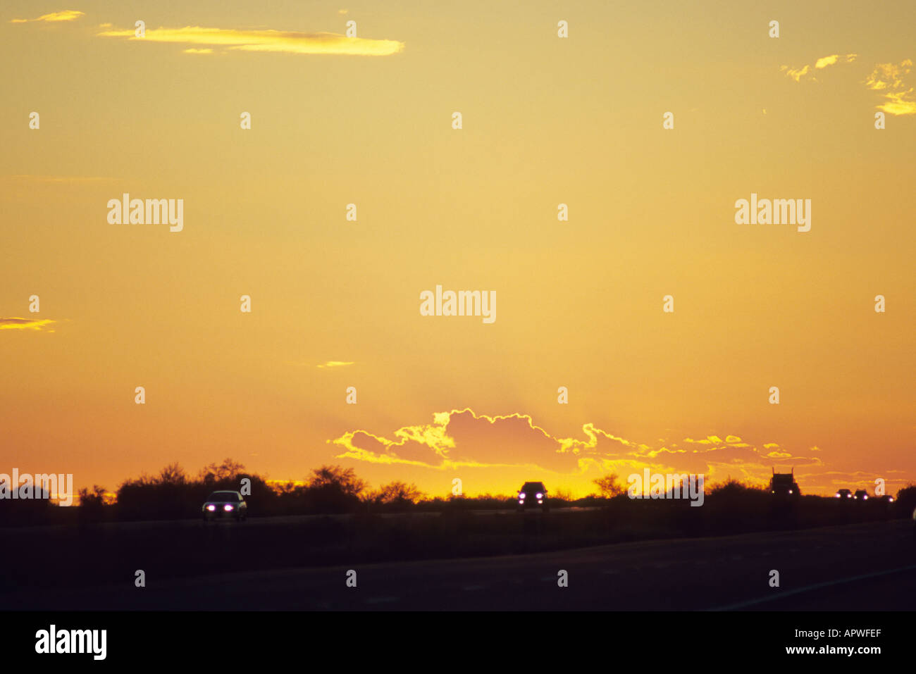 Cars with sunset on Interstate 8 in Arizona Stock Photo - Alamy