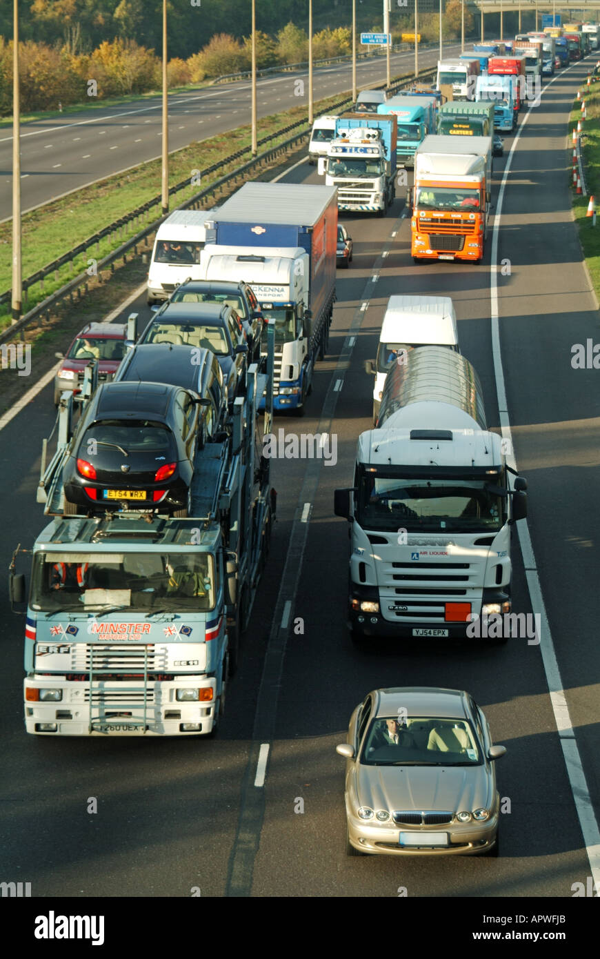 Slow moving traffic on m25 motorway crawls towards a RTA on opposite ...