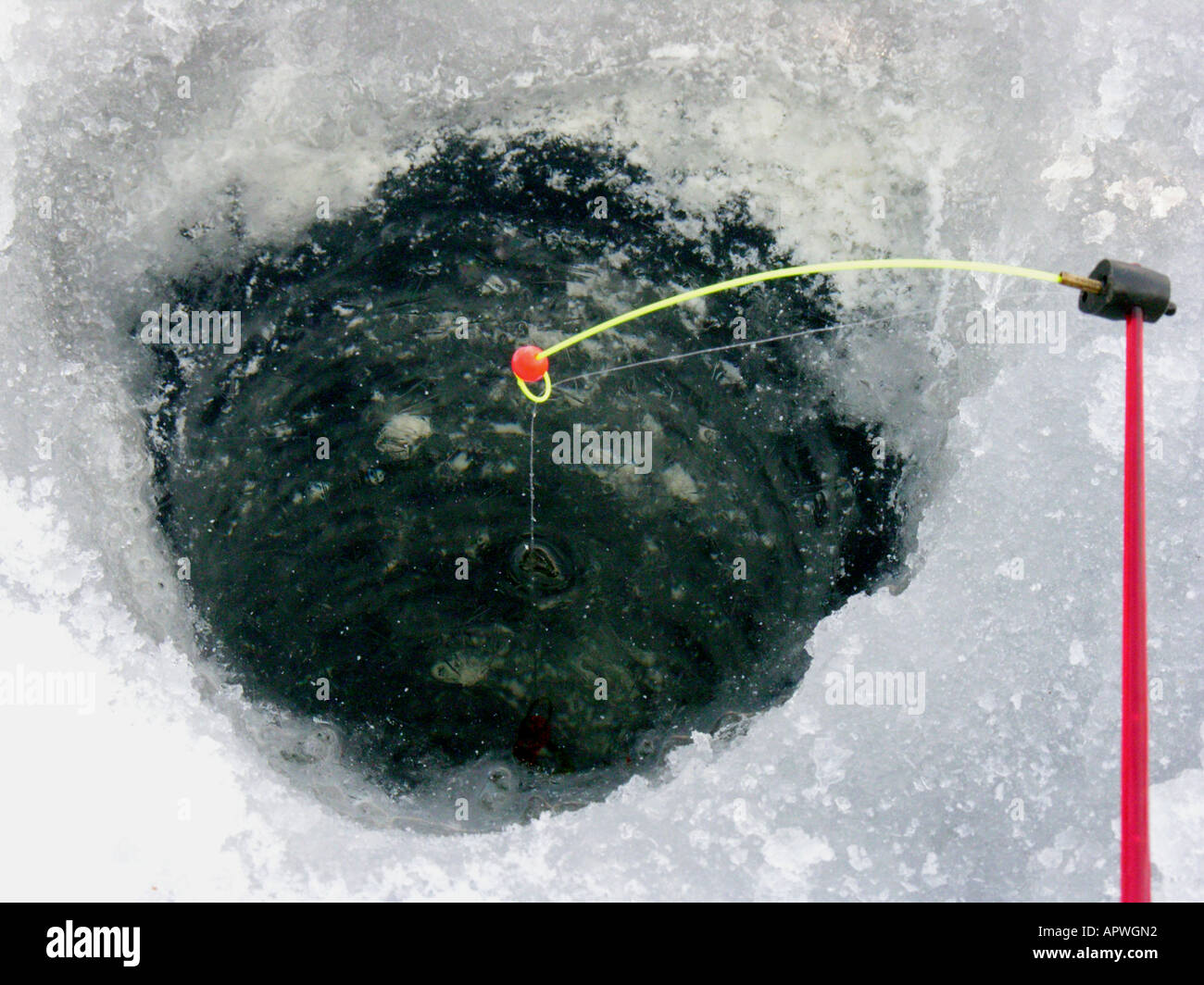 Ice fishing in Ural Mountains Russia Stock Photo - Alamy