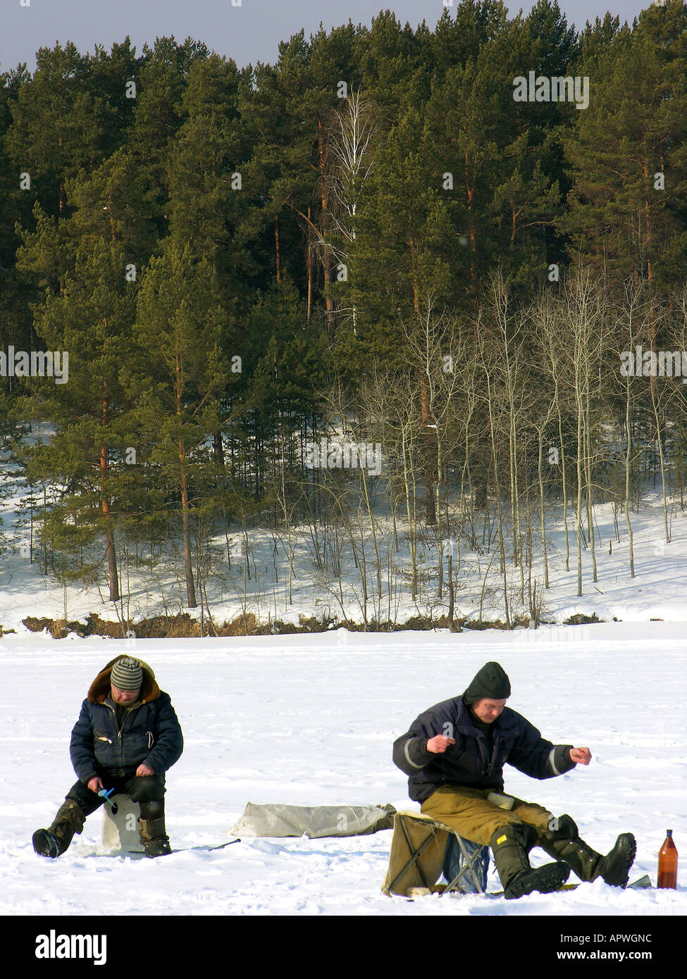 Ice fishing in Ural Mountains Russia Stock Photo - Alamy