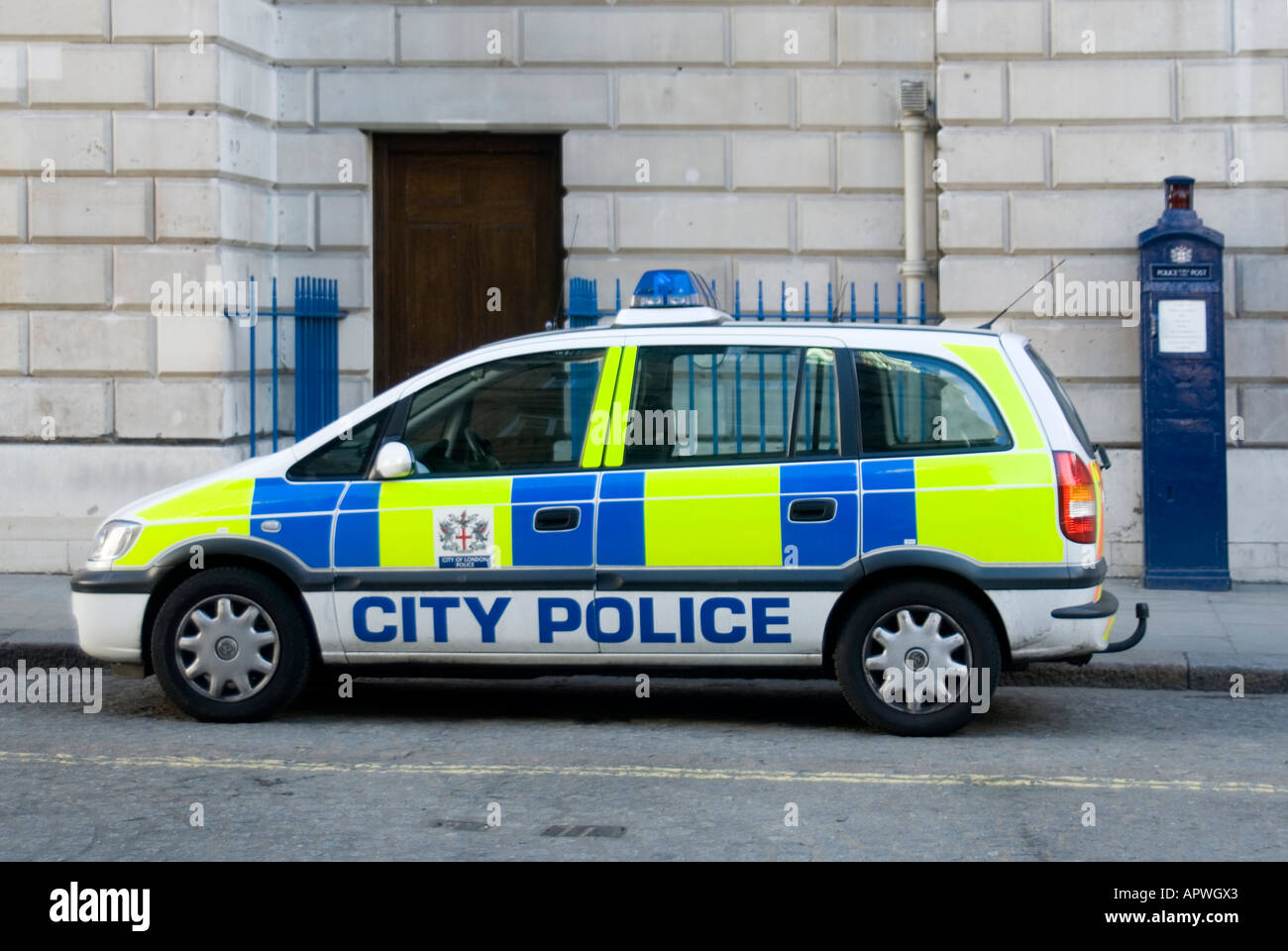 City of London police force patrol car parked beside old style ...